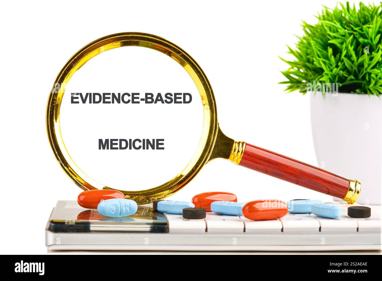 Magnifying glass highlights the phrase evidence based medicine ...