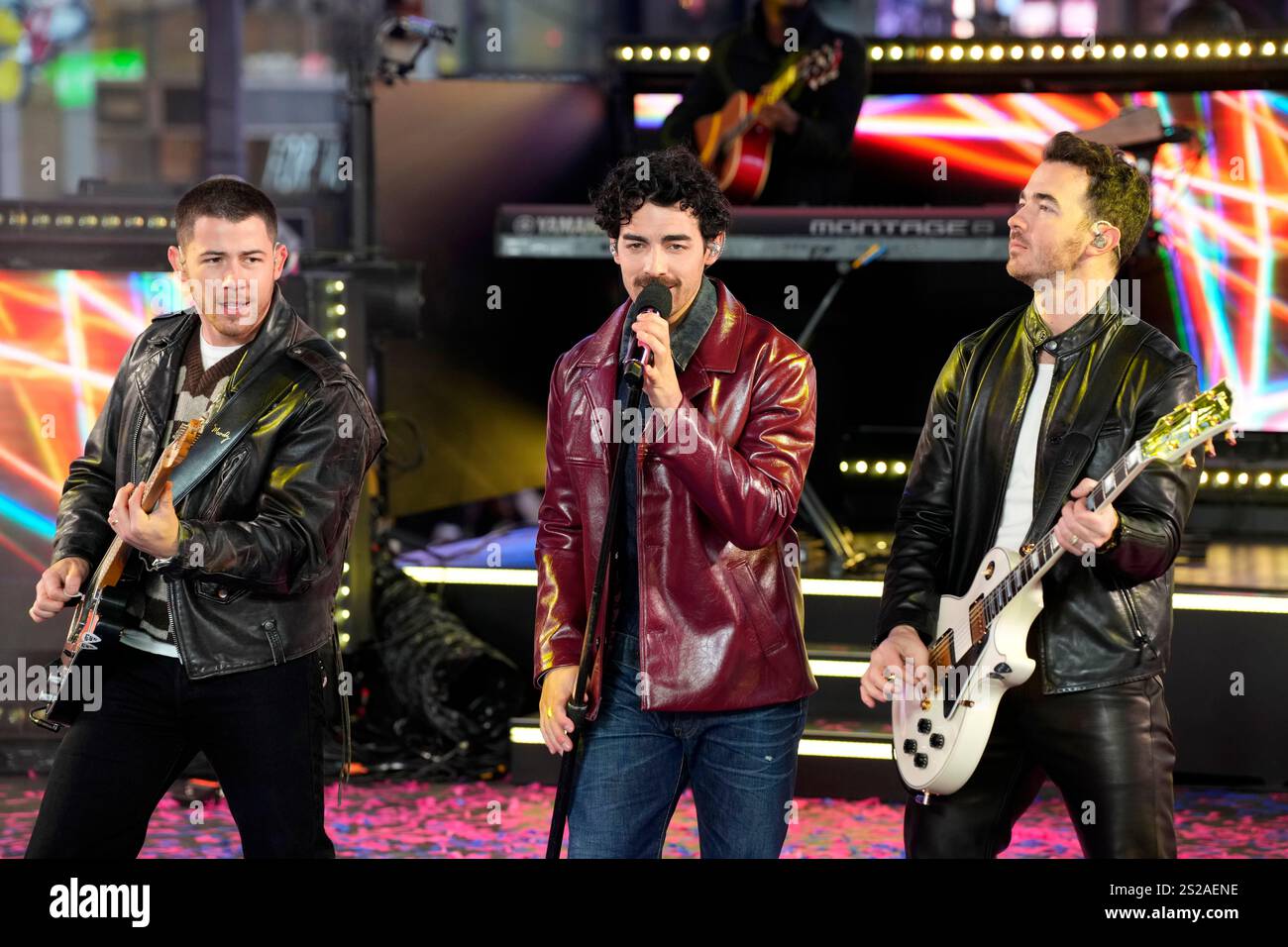 Nick Jonas, from left, Joe Jonas and Kevin Jonas from the Jonas Brothers perform during the ...