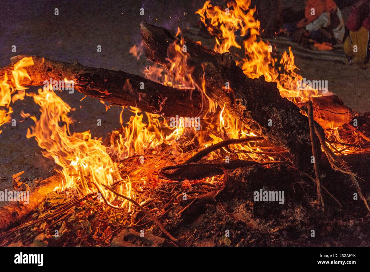 Wood-burning flames in the night Stock Photo - Alamy