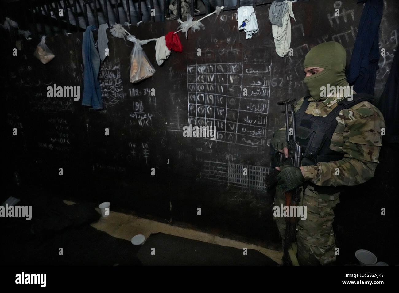 A member of the security forces for the new interim Syrian government ...