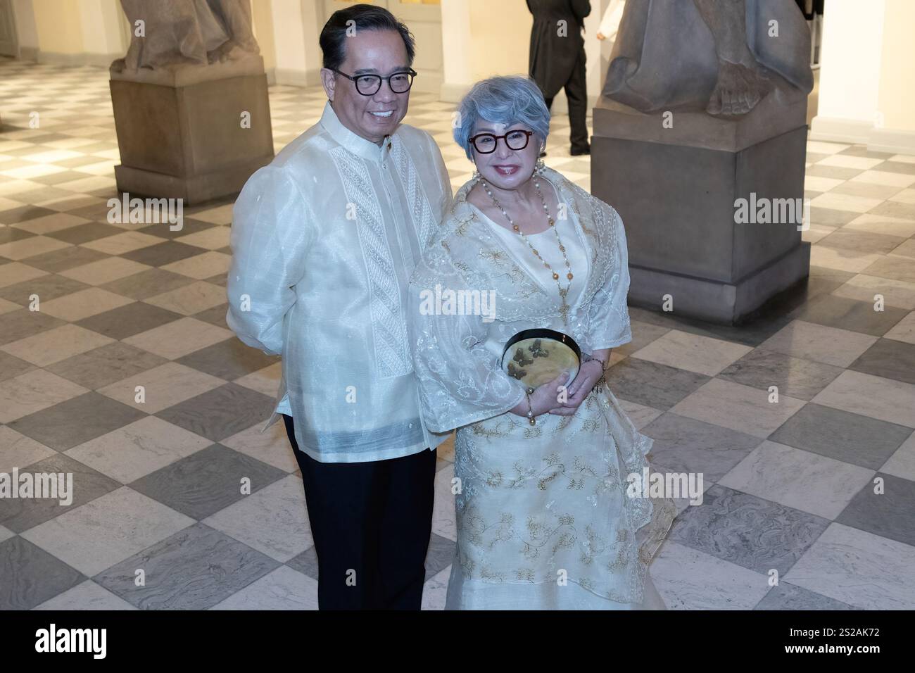Ambassador of Philippines Leo Herrera-Lim (L) and wife Fidelis Herrera ...