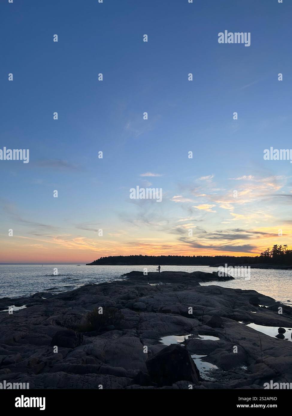 Lake Superior. Scenic sunset on rocks by water Stock Photo - Alamy