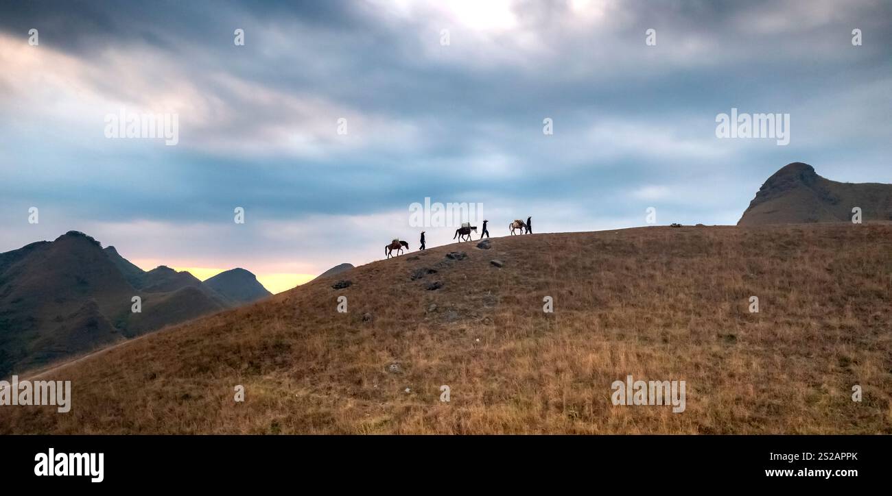 Hilly landscape at sunset hi-res stock photography and images - Alamy