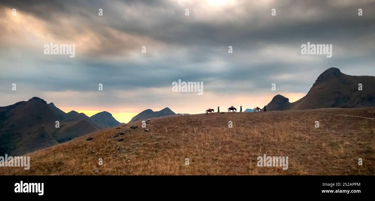 Hilly landscape at sunset hi-res stock photography and images - Alamy
