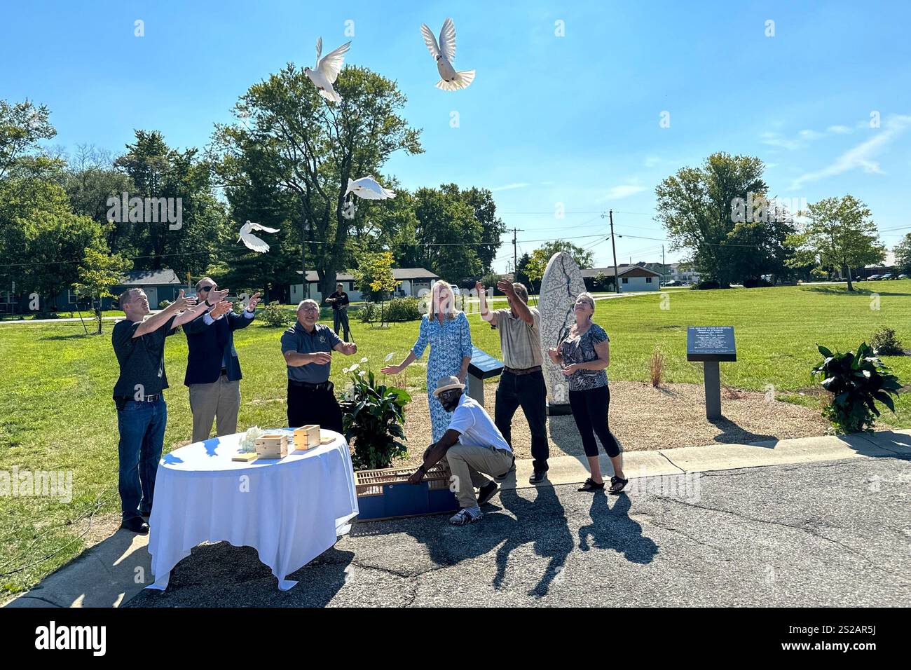 White doves are released on Aug. 29, 2024, in Westfield, Indiana ...