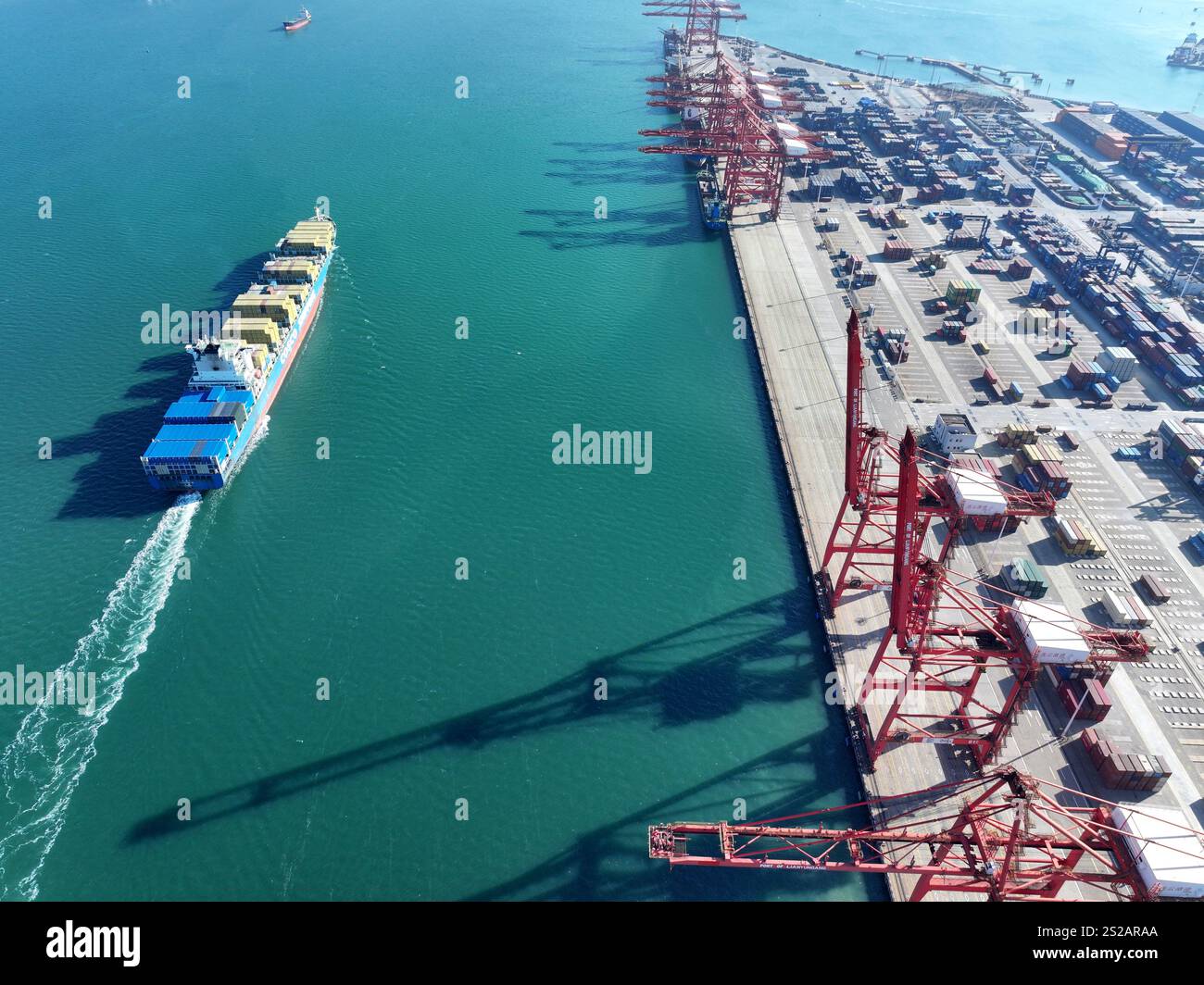 LIANYUNGANG, CHINA - JANUARY 7, 2025 - A cargo ship leaves its berth ...