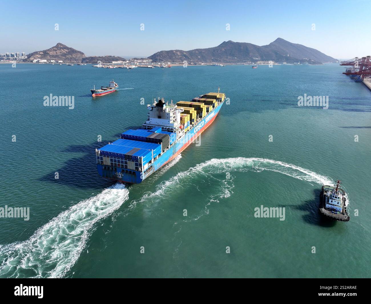 LIANYUNGANG, CHINA - JANUARY 7, 2025 - A cargo ship leaves its berth ...