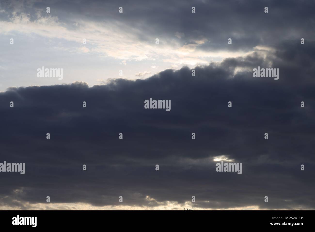 Dark storm clouds loom hi-res stock photography and images - Alamy