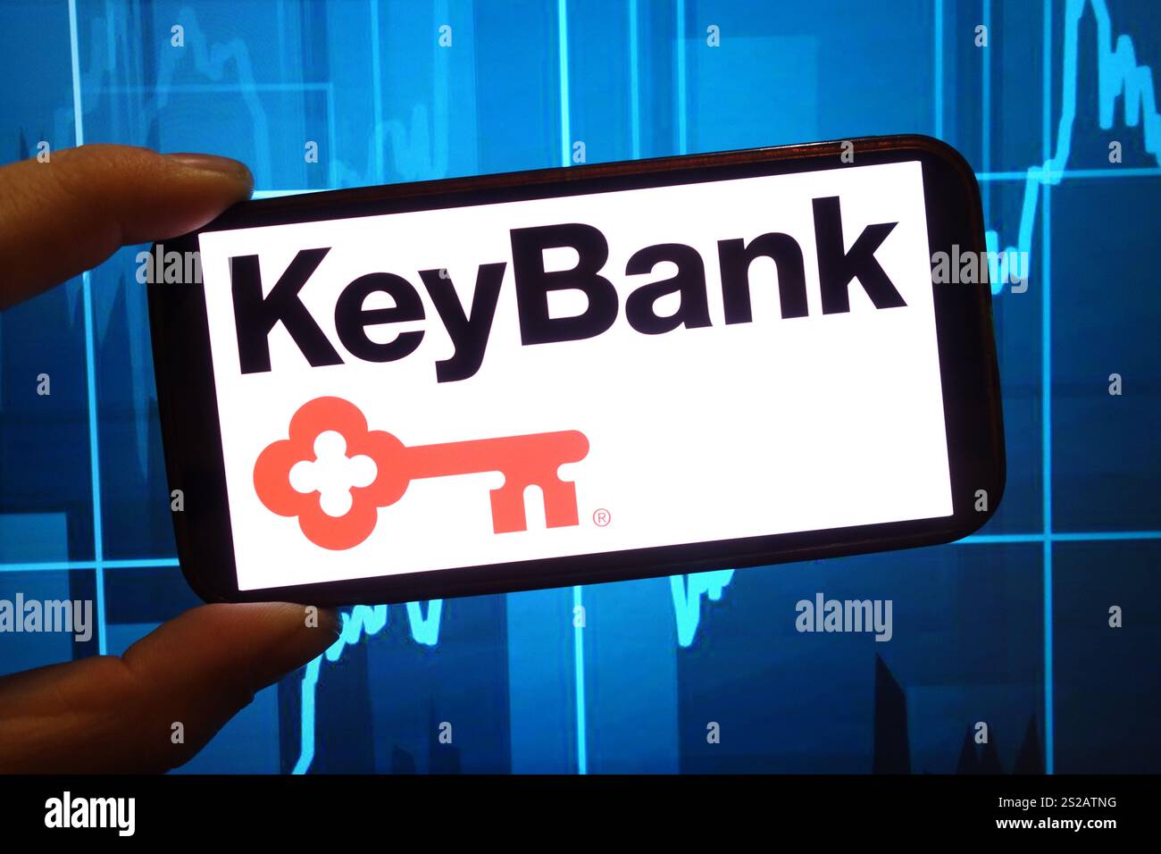 In this photo illustration, the KeyCorp company logo is seen displayed ...
