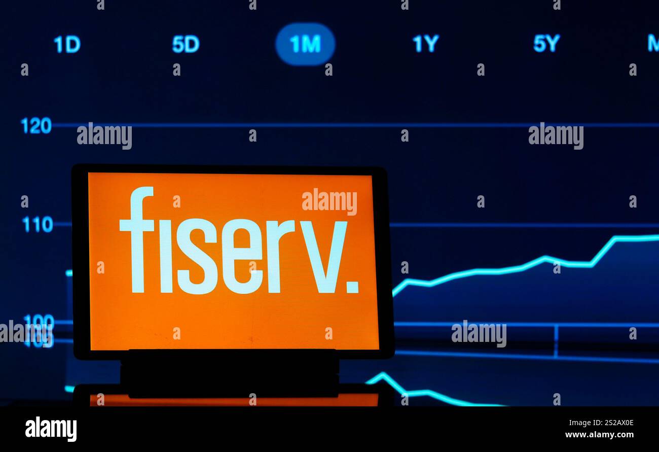 In this photo illustration, a Fiserv, Inc. logo seen displayed on a ...