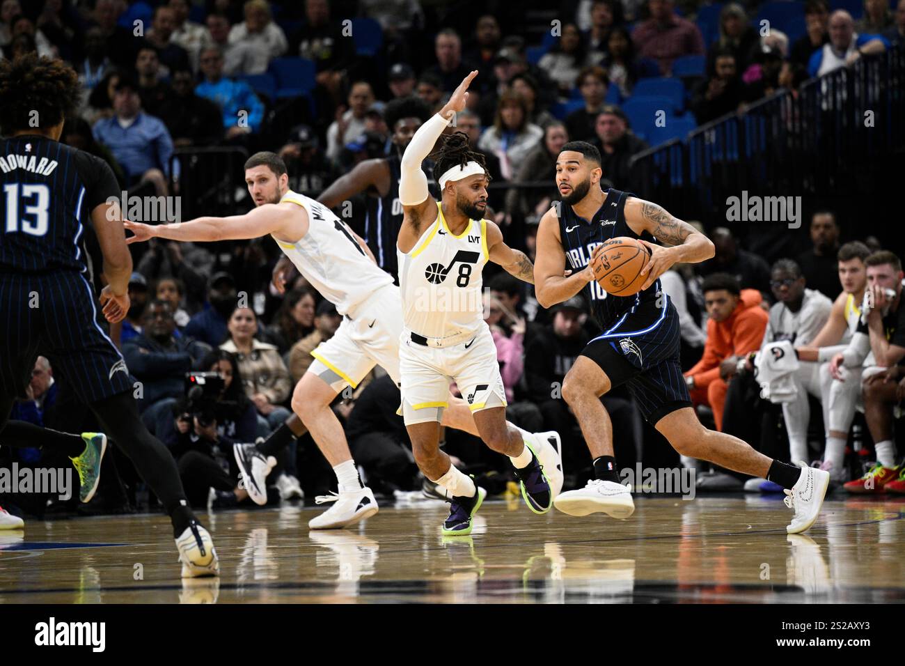 Orlando Magic guard Cory Joseph (10) is defended by Utah Jazz guard ...
