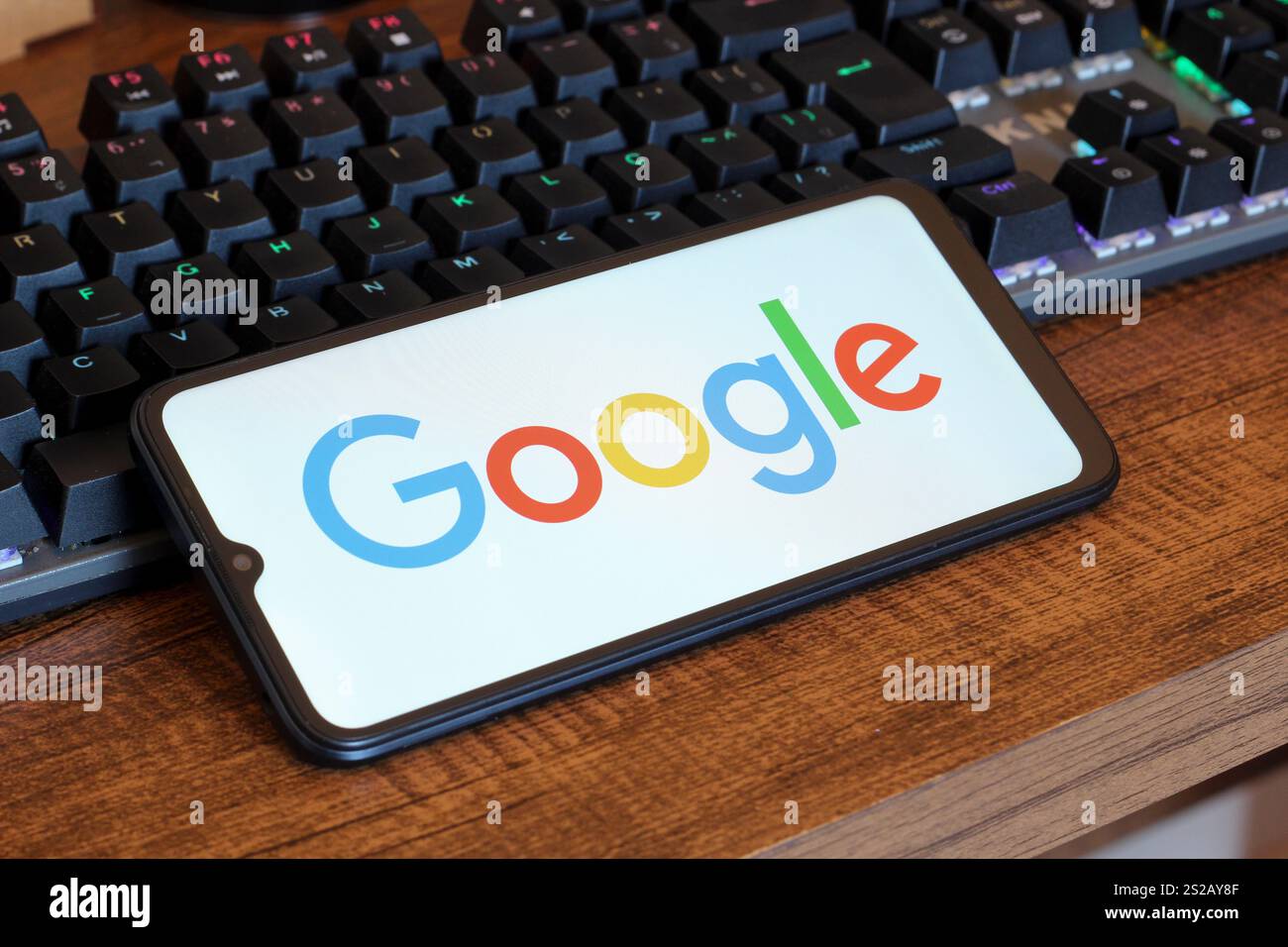 In this photo illustration, the Google company logo is seen displayed ...