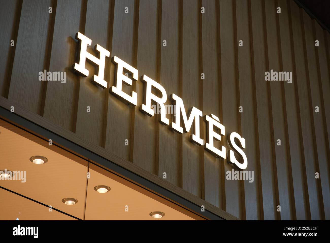HERMES brand logo store sign Stock Photo - Alamy