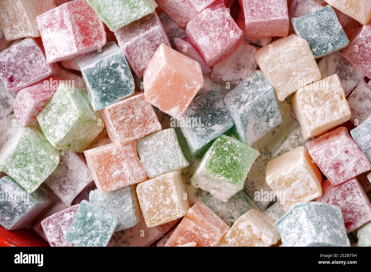 Colorful Turkish delight pieces arranged in a festive display for a ...