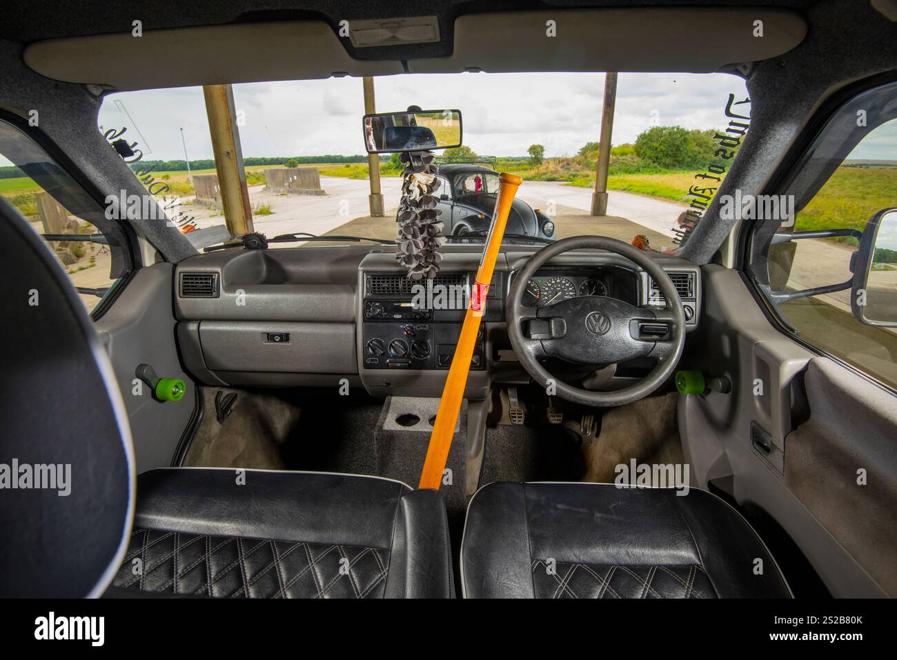 Slammed VW T4 camper van and modified classic VW Beetle Stock Photo - Alamy