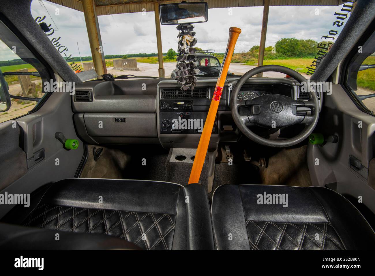 Slammed VW T4 camper van and modified classic VW Beetle Stock Photo - Alamy