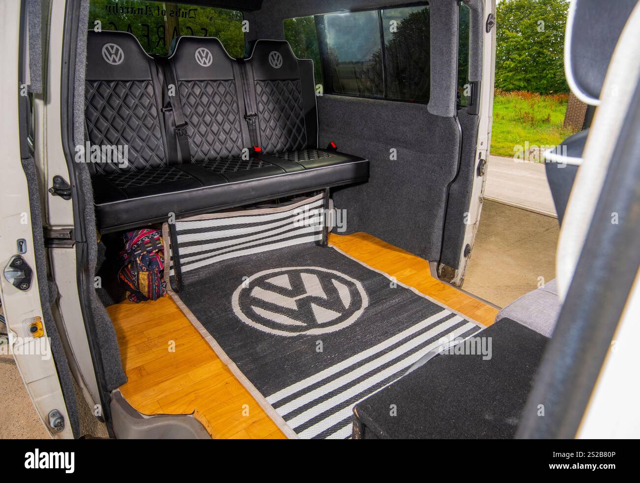 Slammed VW T4 camper van and modified classic VW Beetle Stock Photo - Alamy