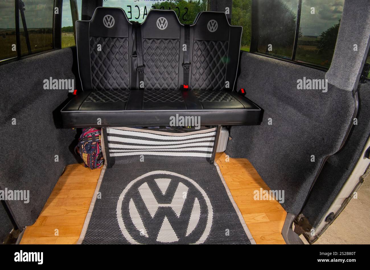 Slammed VW T4 camper van and modified classic VW Beetle Stock Photo - Alamy