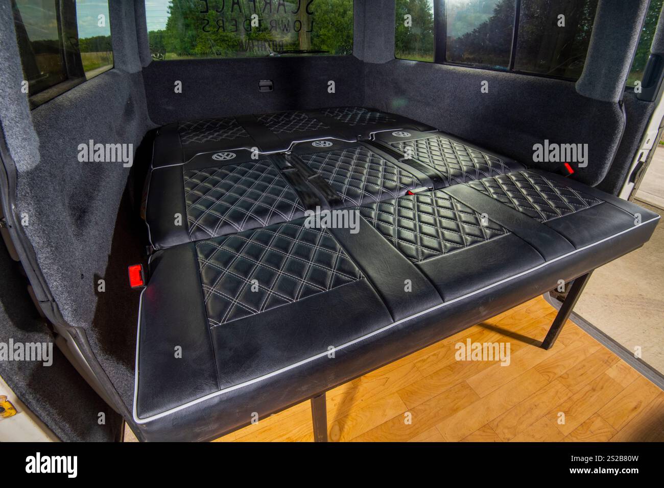 Slammed VW T4 camper van and modified classic VW Beetle Stock Photo - Alamy