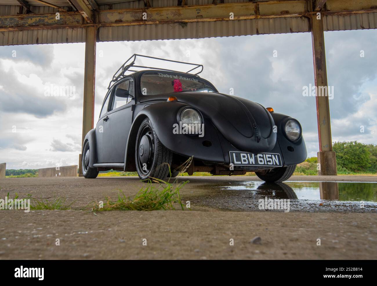 Slammed VW T4 camper van and modified classic VW Beetle Stock Photo - Alamy