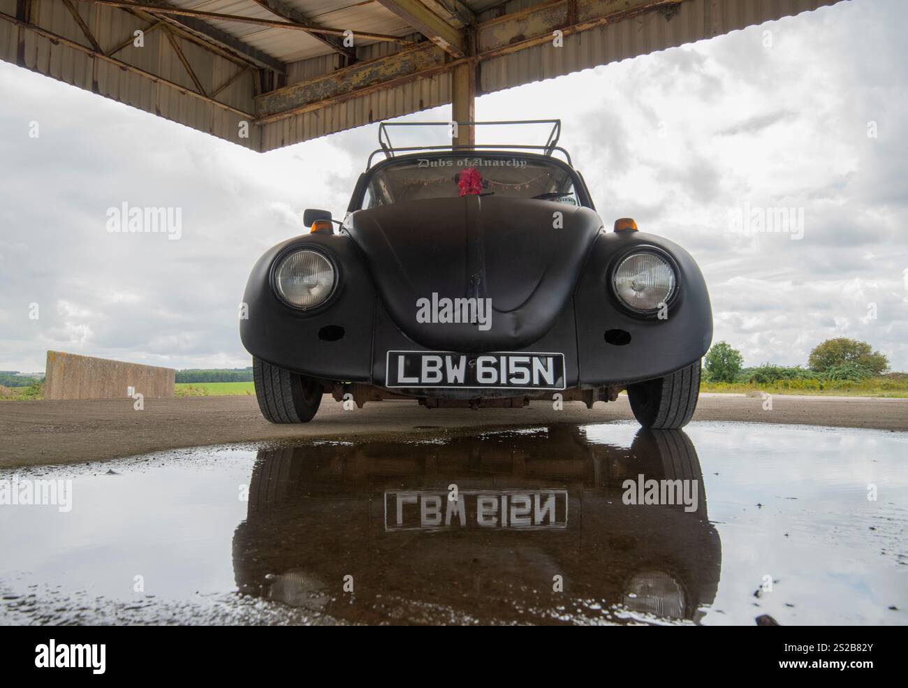 Slammed VW T4 camper van and modified classic VW Beetle Stock Photo - Alamy