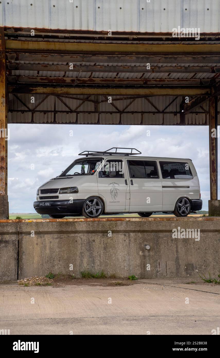 Slammed VW T4 camper van and modified classic VW Beetle Stock Photo - Alamy