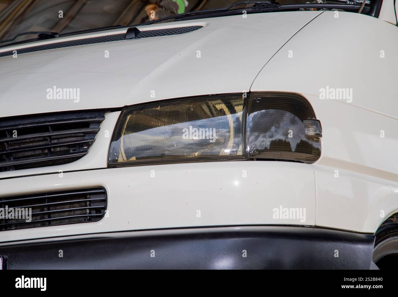 Slammed VW T4 camper van and modified classic VW Beetle Stock Photo - Alamy