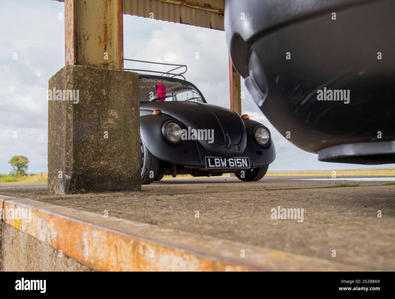 Slammed VW T4 camper van and modified classic VW Beetle Stock Photo - Alamy