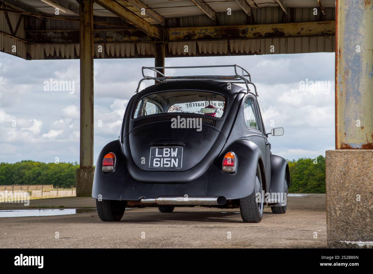 Slammed VW T4 camper van and modified classic VW Beetle Stock Photo - Alamy