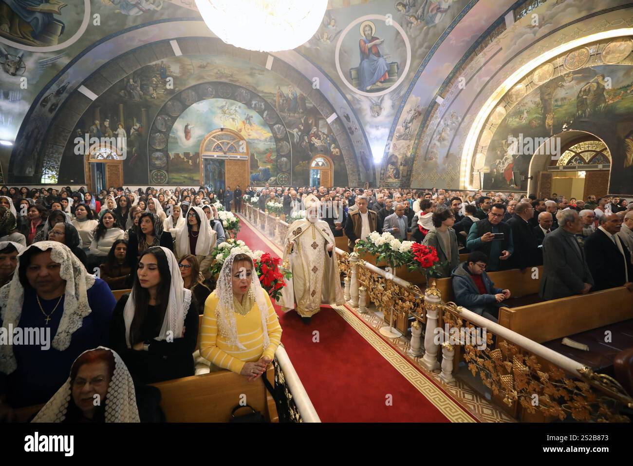 Coptic Orthodox Christians attend Christmas Eve mass in Cairo, Egypt A ...