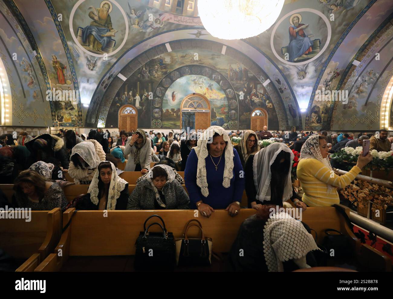 Coptic Orthodox Christians attend Christmas Eve mass in Cairo, Egypt ...