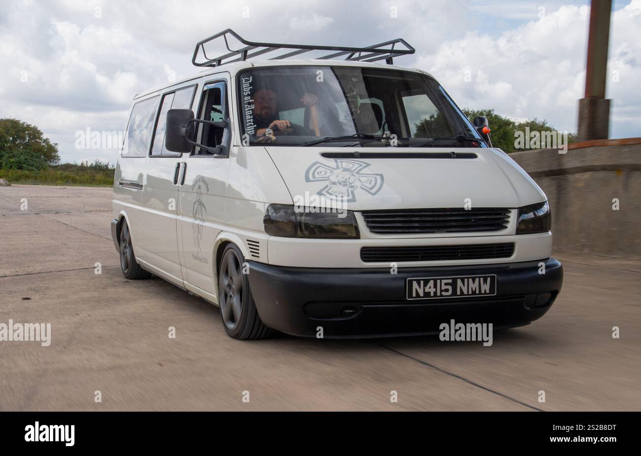 Slammed VW T4 camper van and modified classic VW Beetle Stock Photo - Alamy