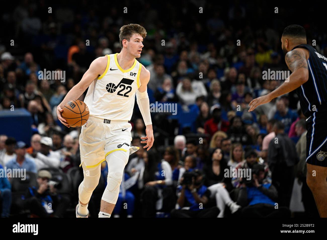 Utah Jazz forward Kyle Filipowski (22) brings the ball up the court in ...