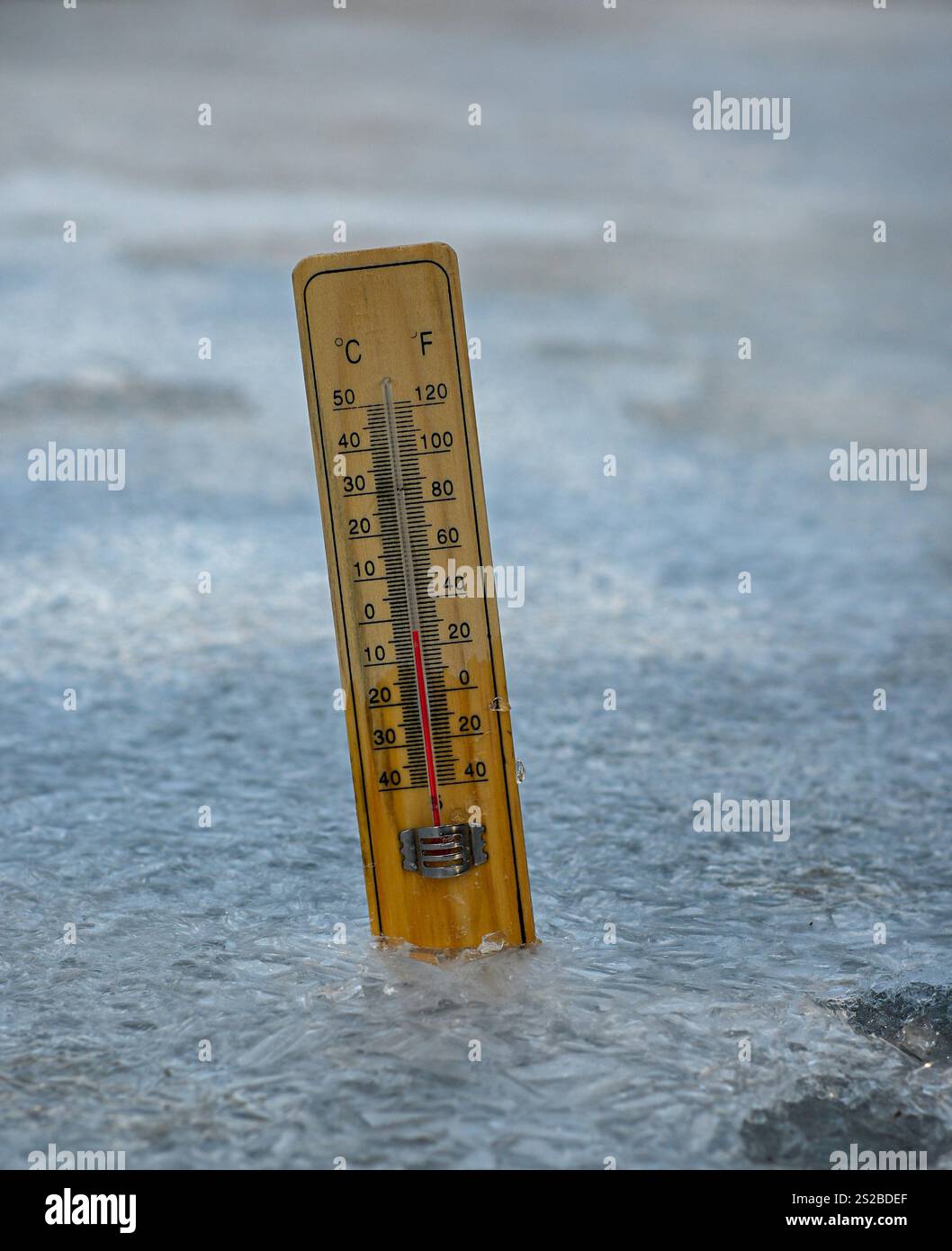 Wooden thermometer showing sub-zero temperature in celsius and ...
