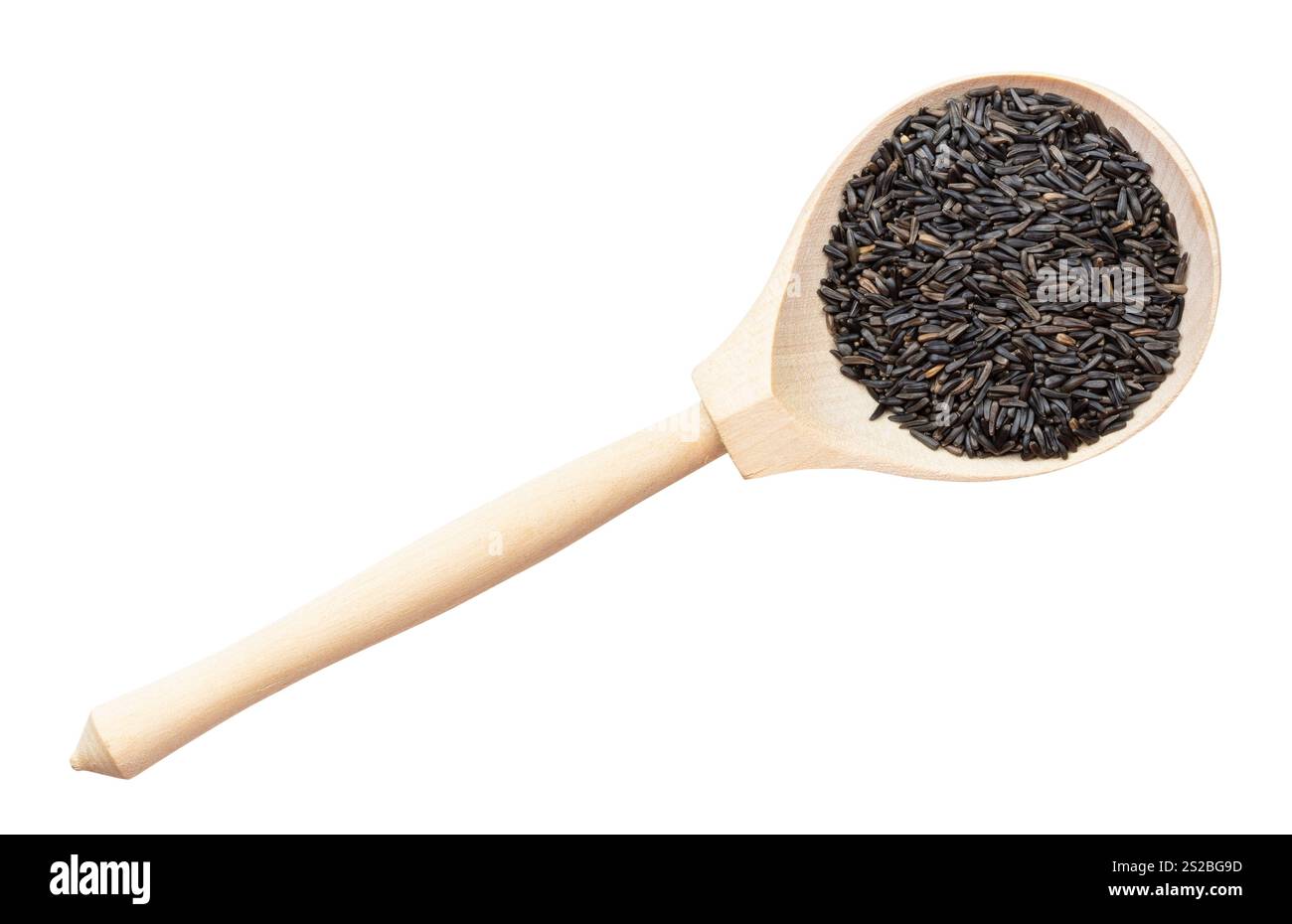 top view of whole-grain niger seeds (Guizotia Abyssinica) in wood spoon ...