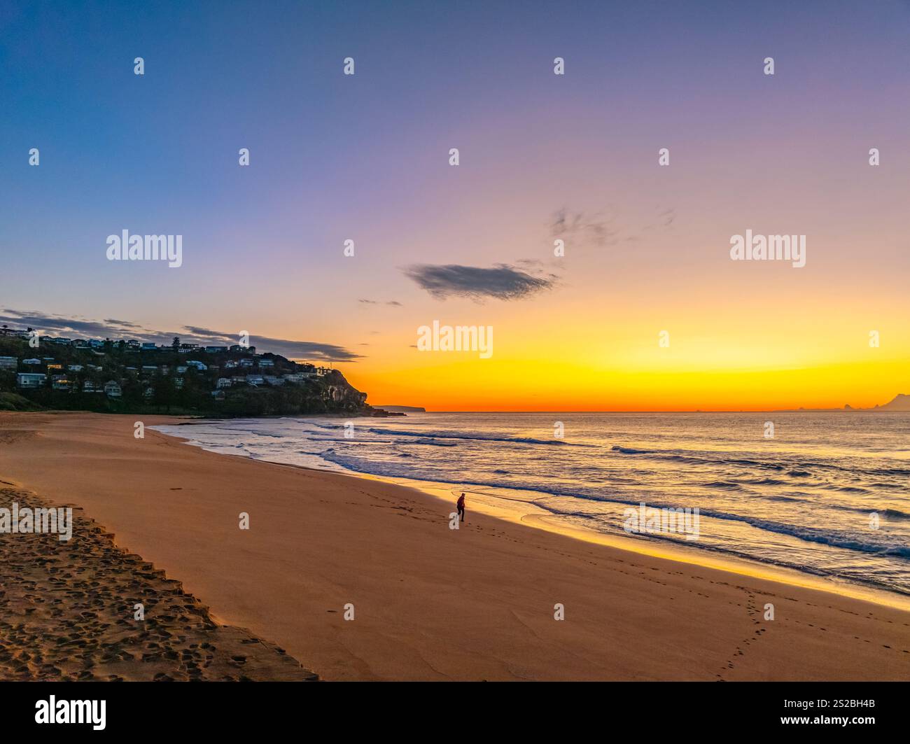 Aerial sunrise over Whale Beach in the Northern Beaches region of ...