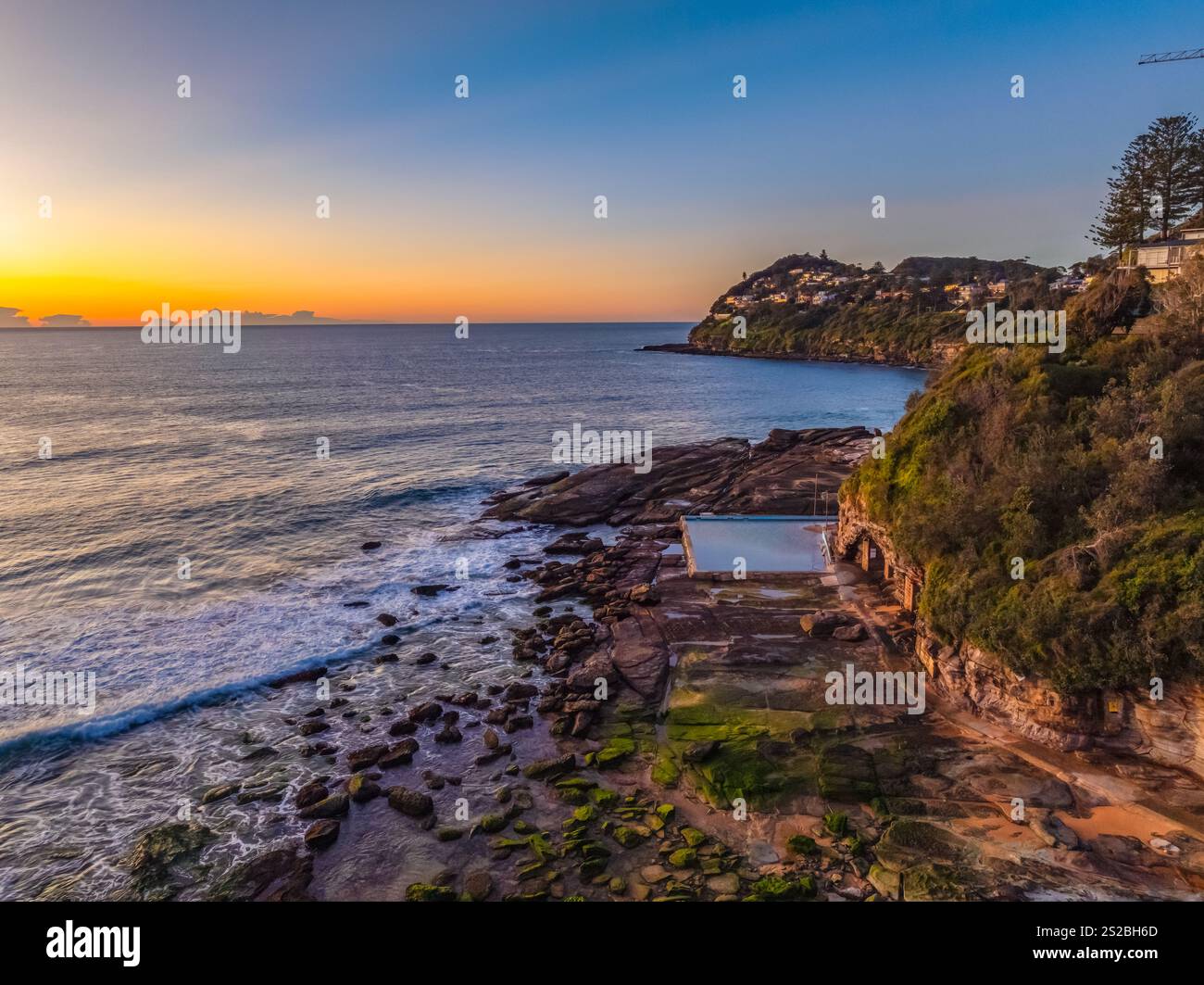 Aerial sunrise over Whale Beach in the Northern Beaches region of ...