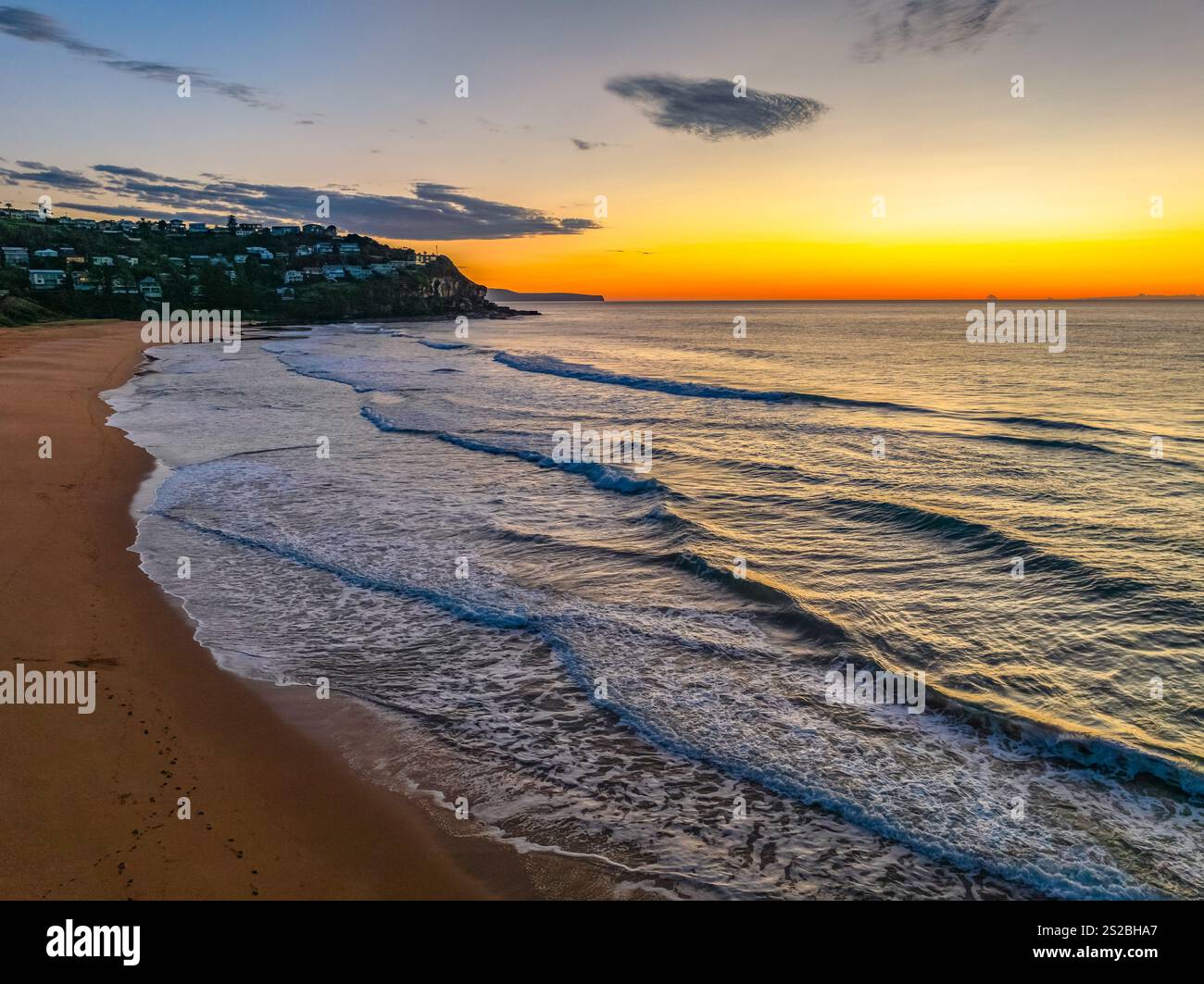 Aerial sunrise over Whale Beach in the Northern Beaches region of ...