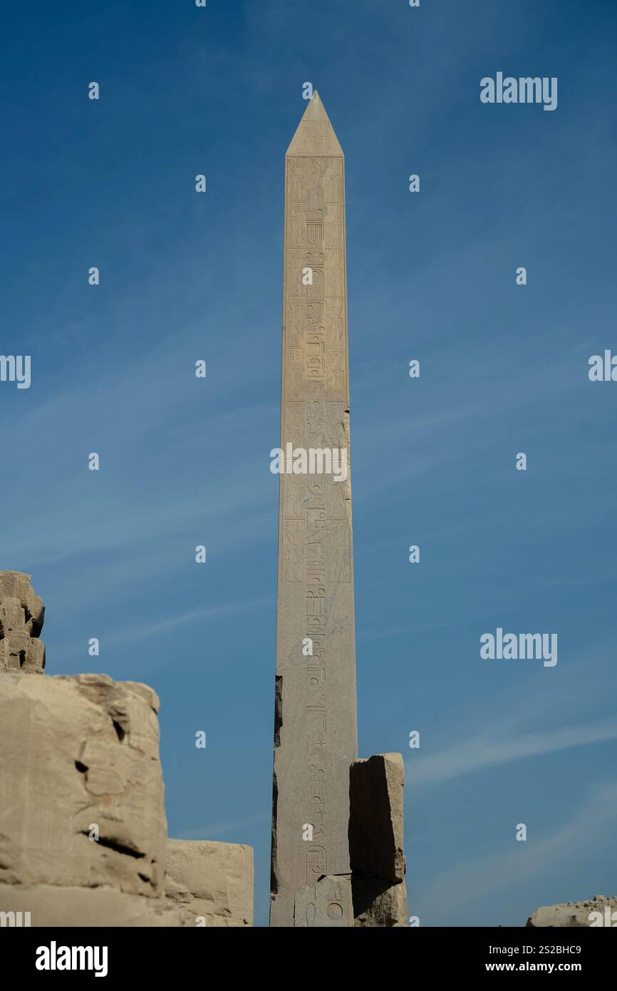 Egyptian Ancient Obelisk Behind Walls of Ruined Wall Against Sky Stock Photo - Alamy