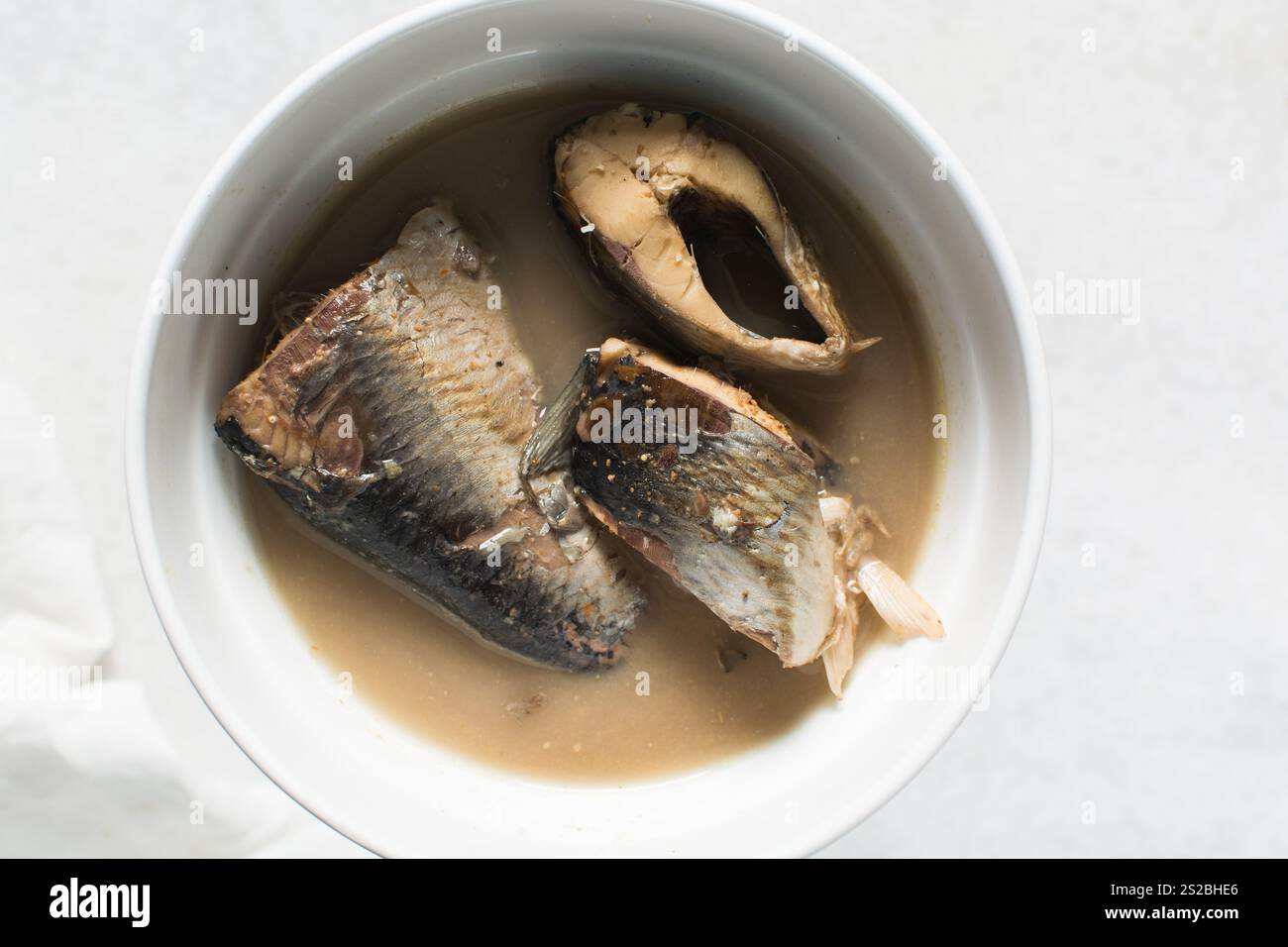 Overhead view of Nigerian pepper soup with fish, top view of fish ...