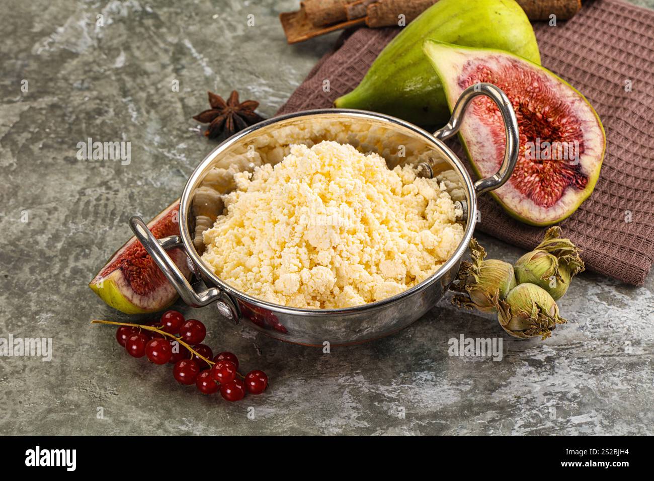 Delicous sheep cottage cheese curd served fig Stock Photo - Alamy