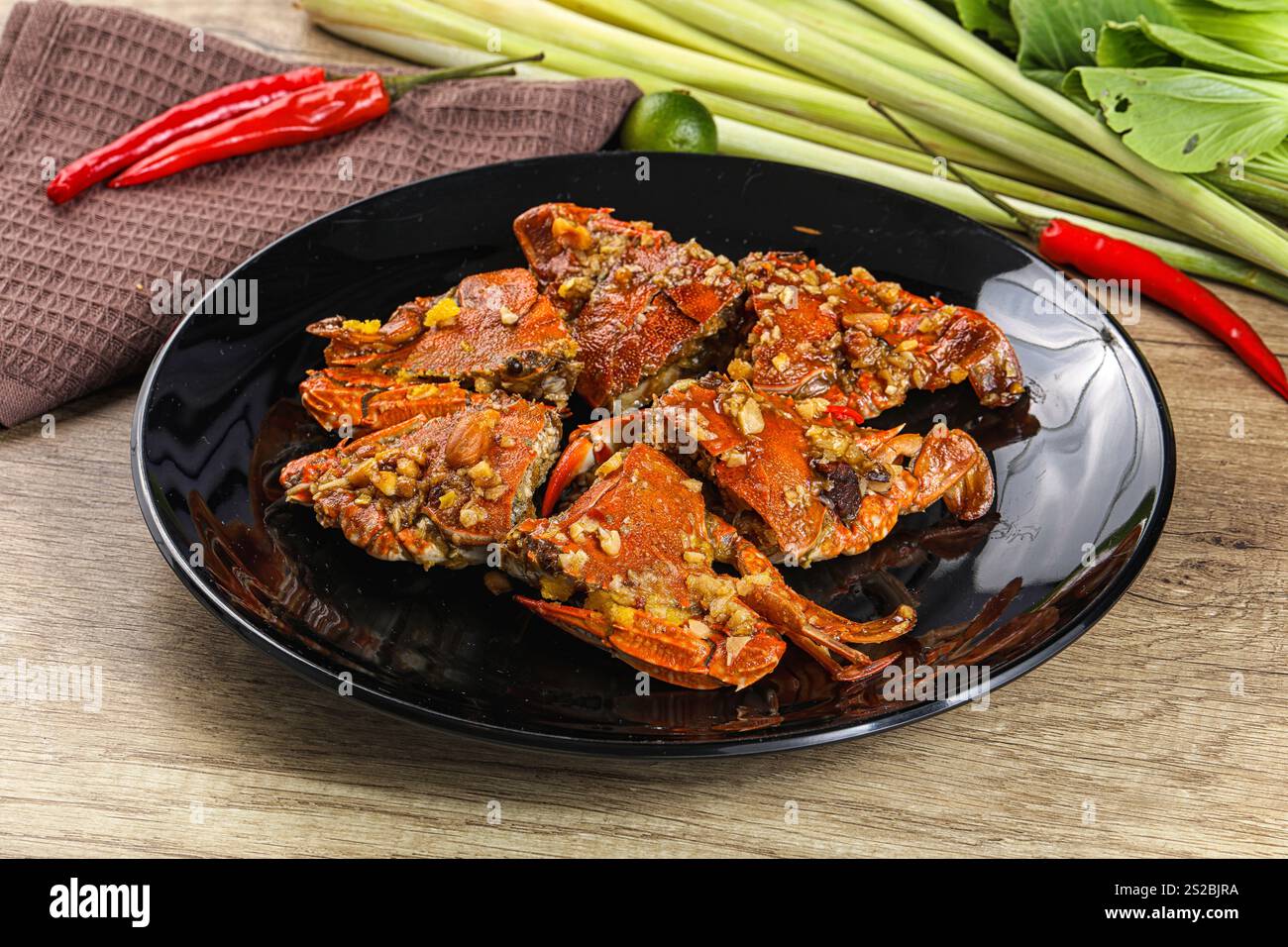 Tasty Steamed Spider crab Claws in tamatind sauce Stock Photo - Alamy