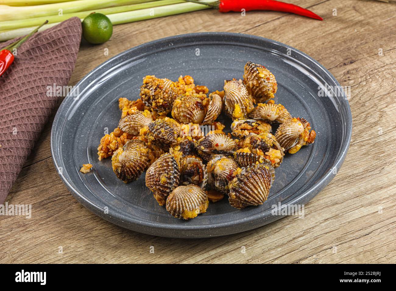 Blood Cockle Fried With Garlic and spices Stock Photo - Alamy