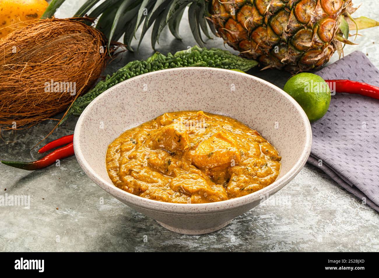 Indian cuisne - Chicken massala with sauce and spices Stock Photo - Alamy