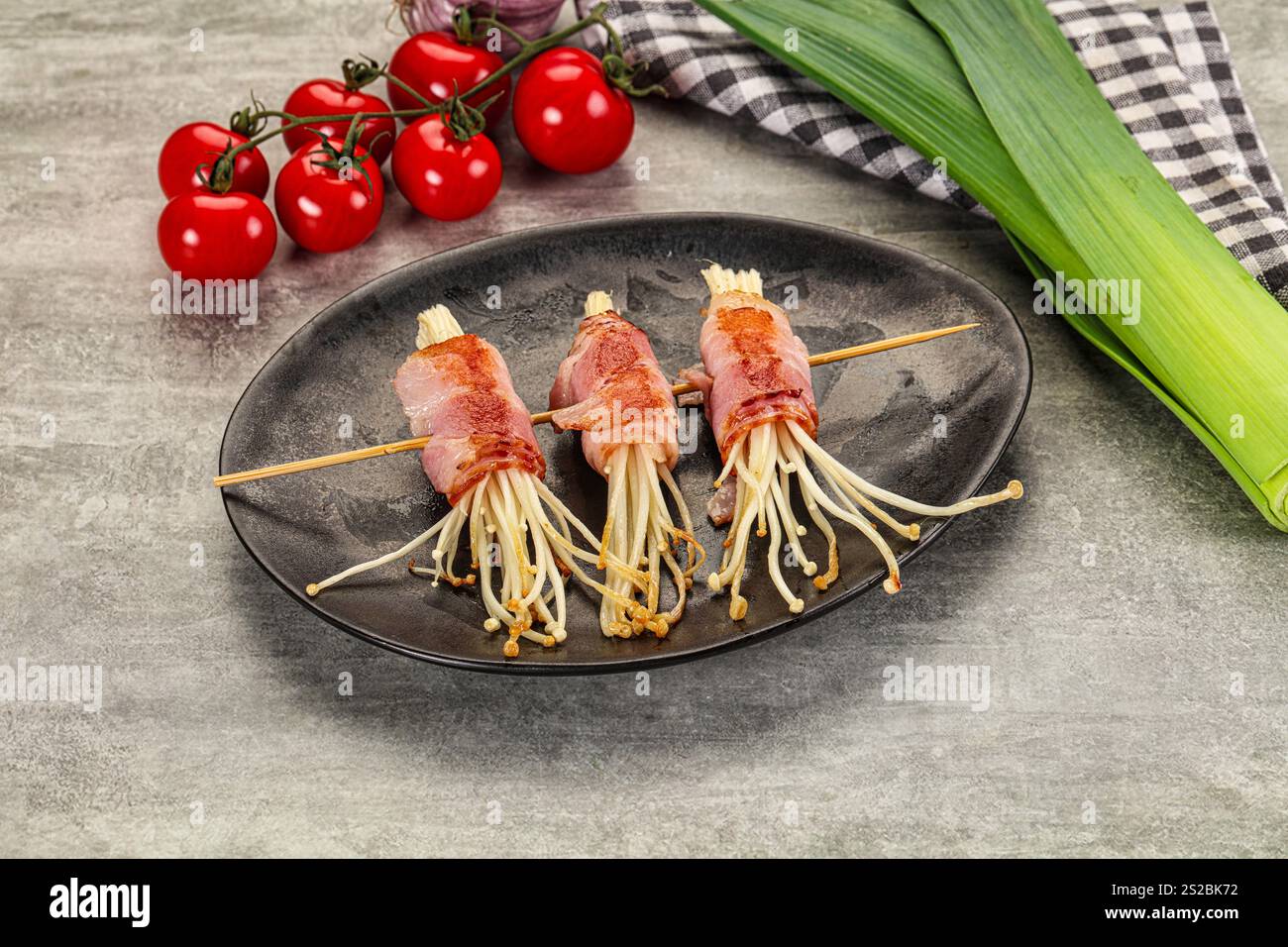 Grilled enoki mushroom with bacon roll wrap Stock Photo - Alamy