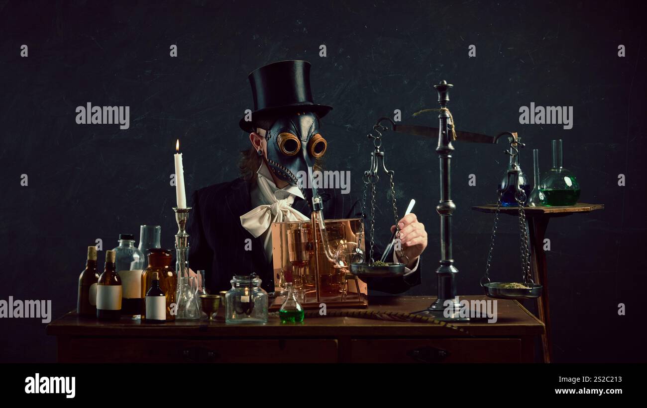 Mysterious person in plague doctor mask surrounded by equipment in ...