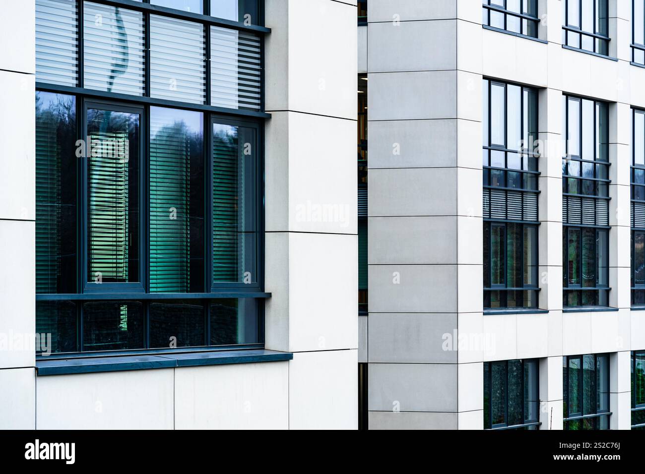 Modern Office Building with Repetitive Window Pattern and Minimalist ...