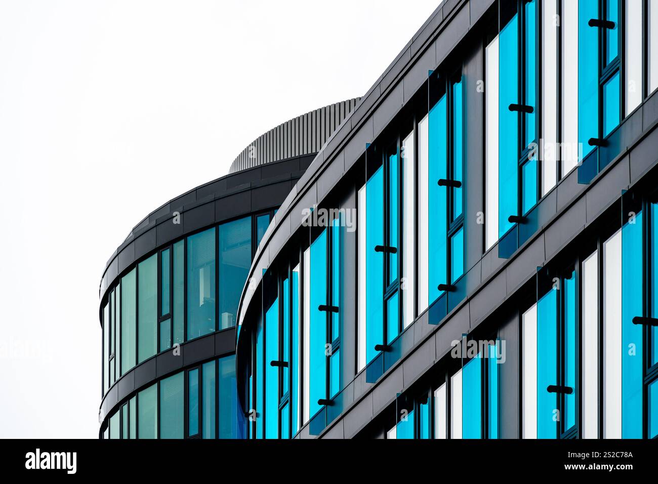 Modern Glass Office Building with Blue-Tinted Windows and Sleek Architectural Design Stock Photo ...