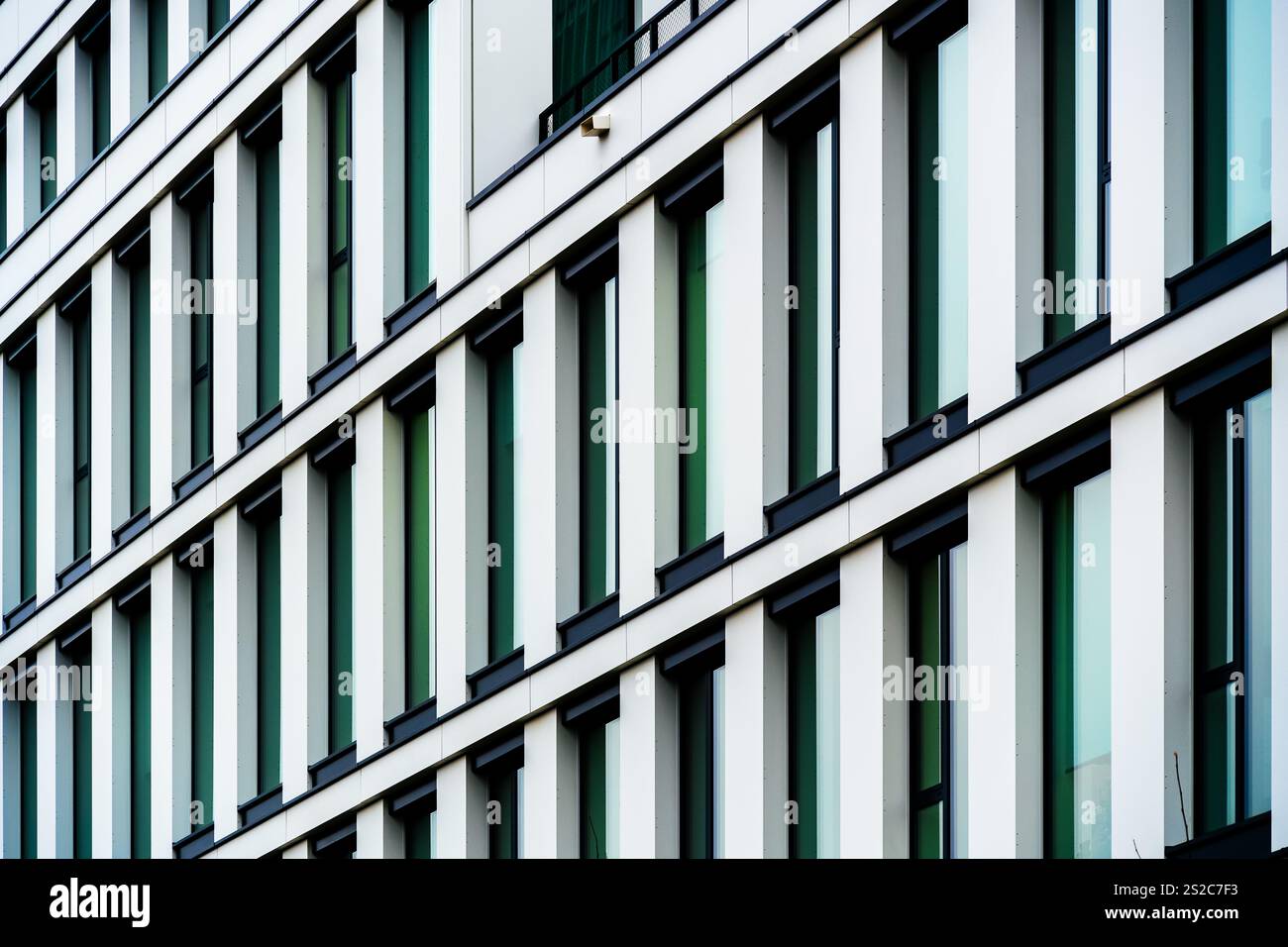 Modern Office Building with Repetitive Window Pattern and Minimalist ...