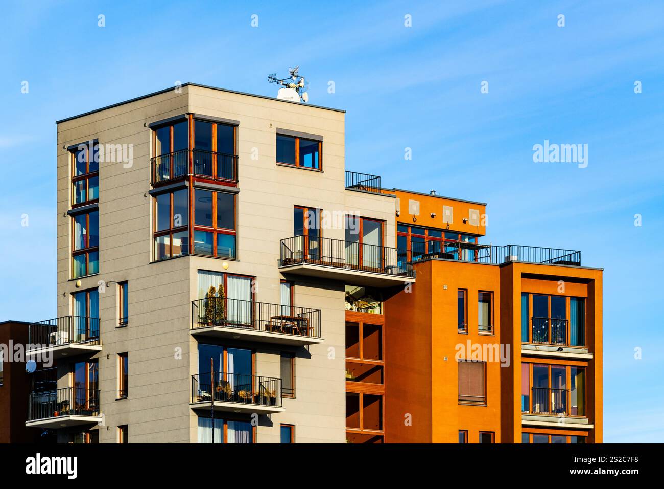 Modern Multi-Story Residential Building with Vibrant Facade, Large ...